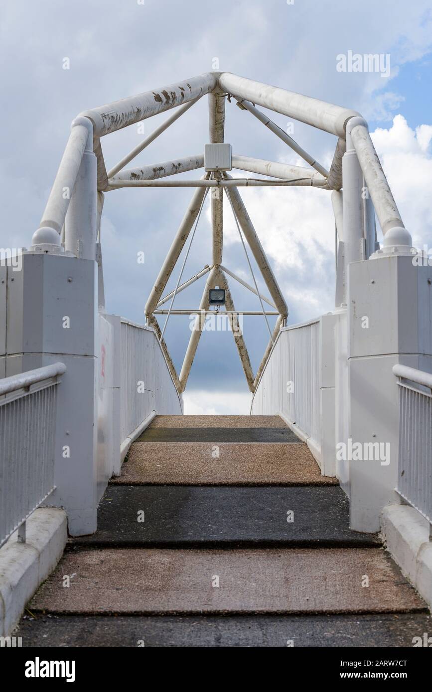 A fragment of a stepped ascent to the pedestrian bridge between the ...