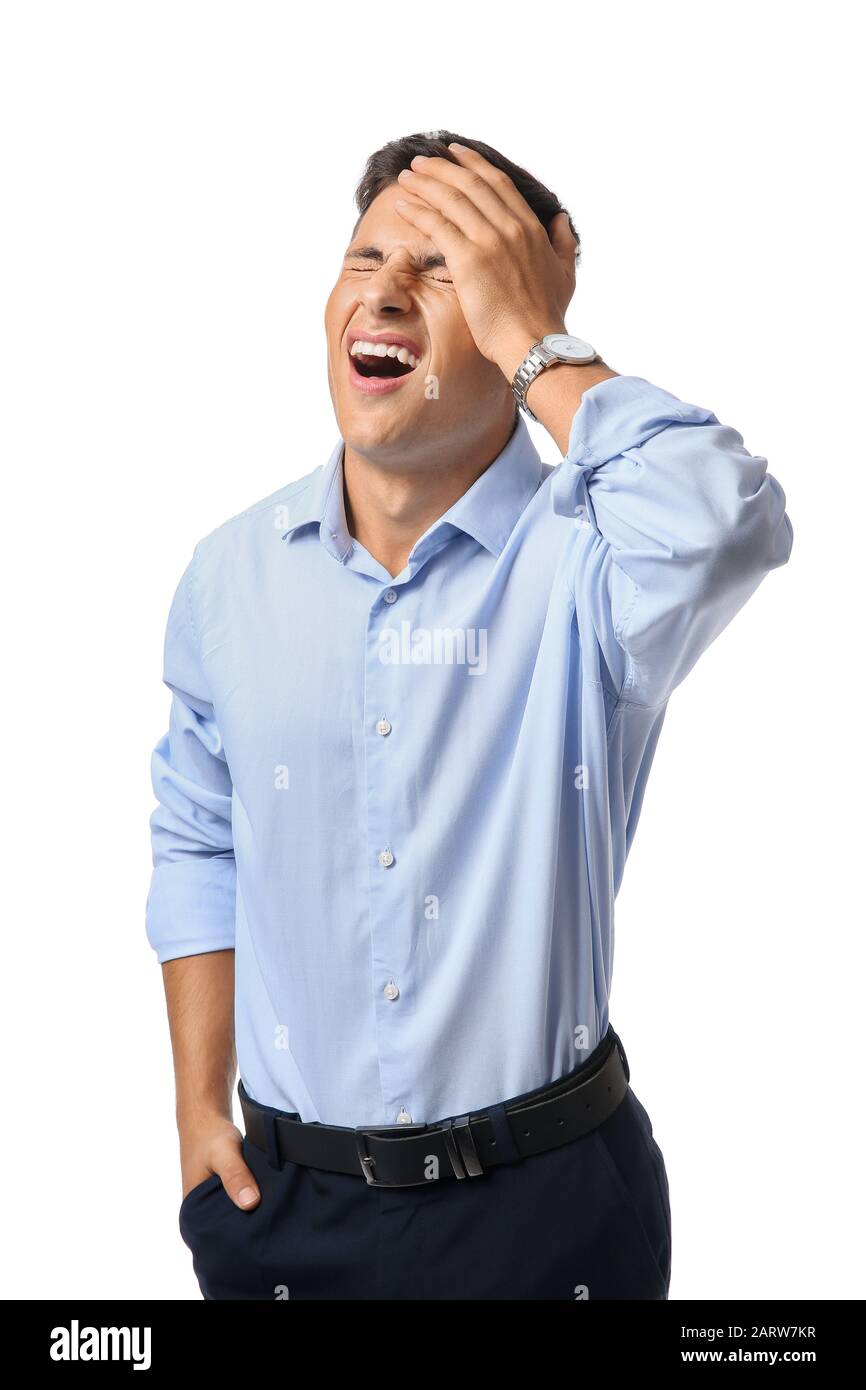 Portrait of hopeless young businessman on white background Stock Photo ...