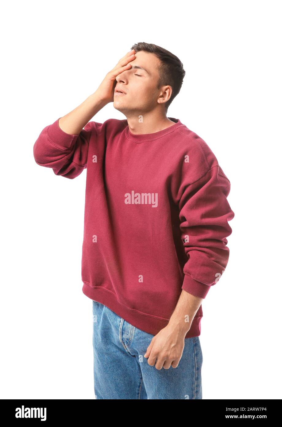 Portrait of young man after making mistake on white background Stock ...