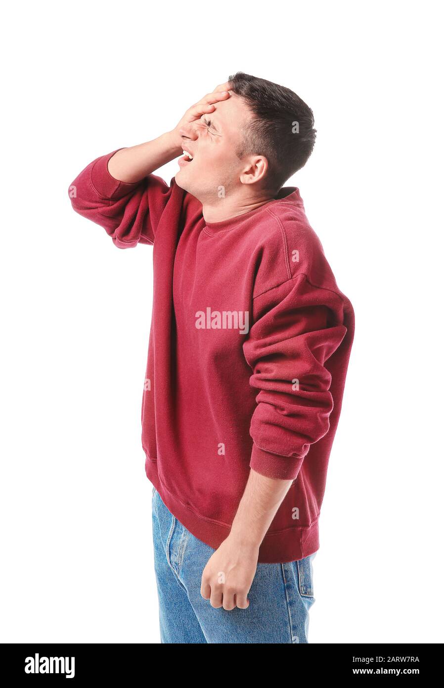 Portrait of young man after making mistake on white background Stock ...