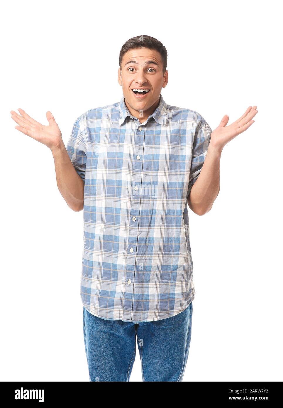 Portrait of helpless young man on white background Stock Photo - Alamy