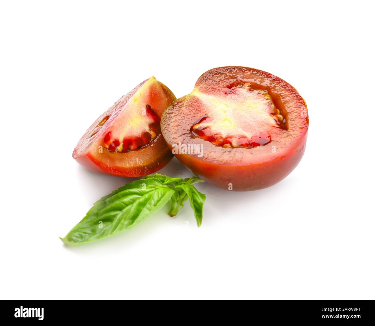 Fresh cut tomato on white background Stock Photo - Alamy