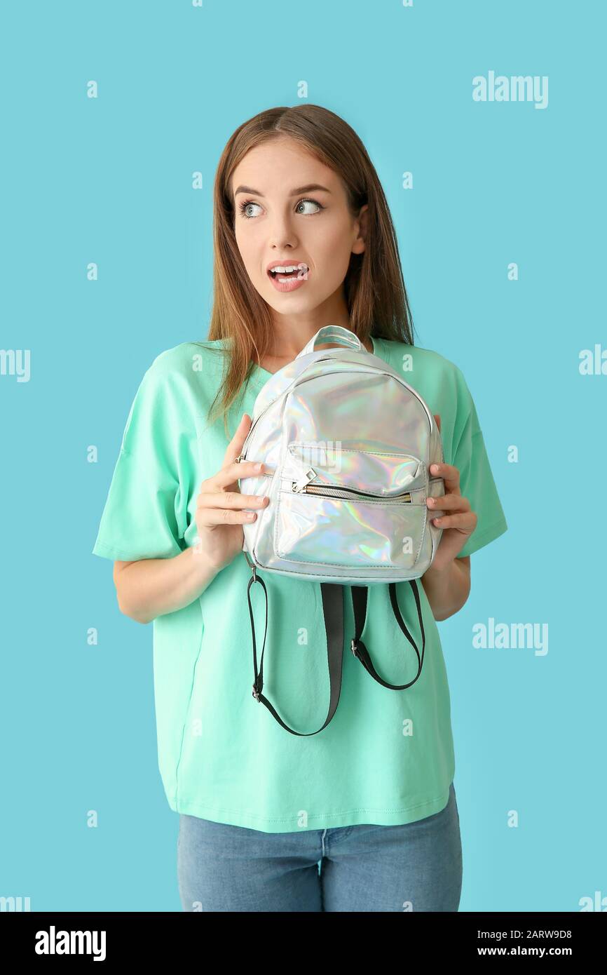 Beautiful female student on color background Stock Photo - Alamy