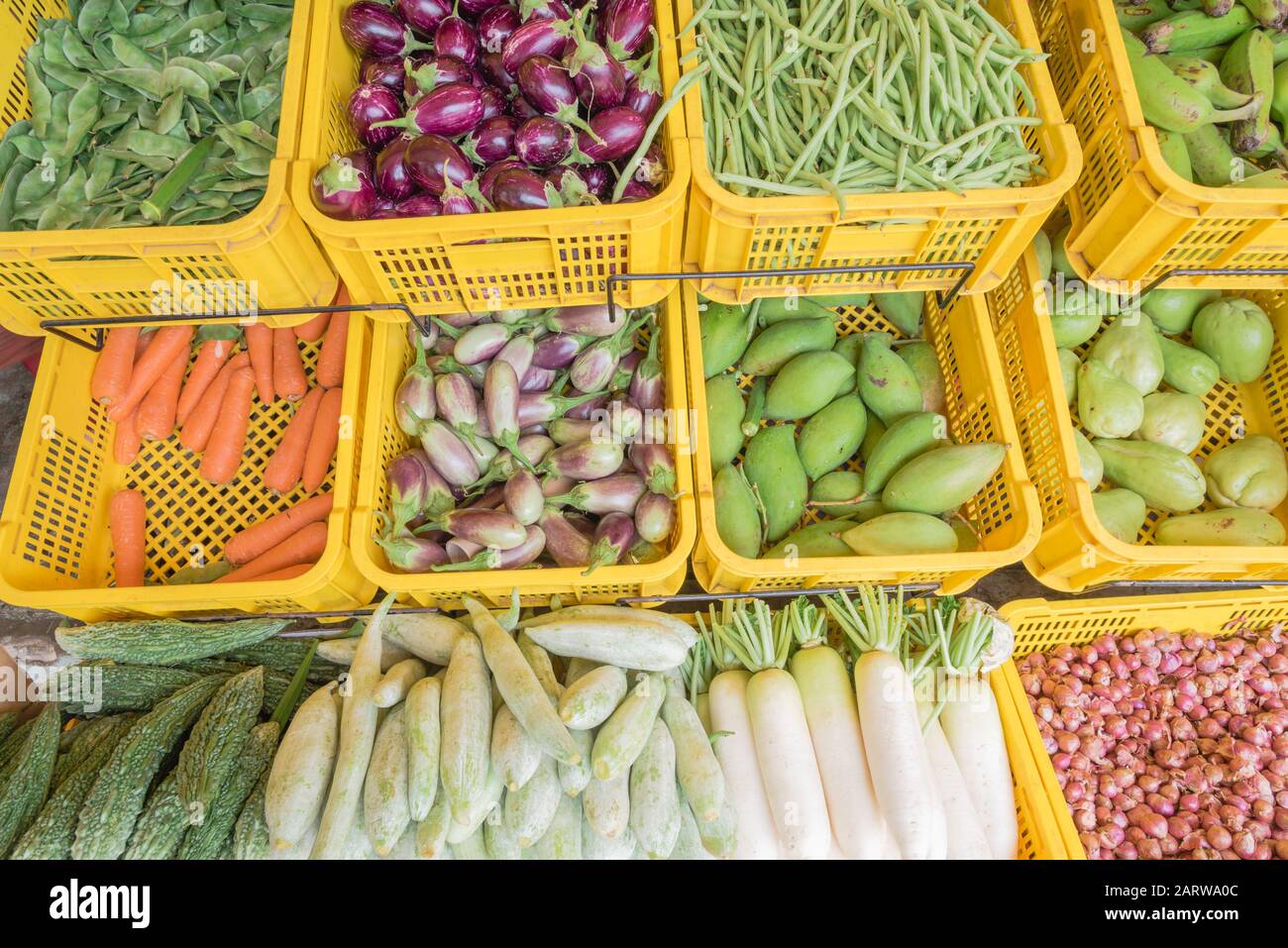 Arrange of plastic crates filled with organic locally grown vegetables ...