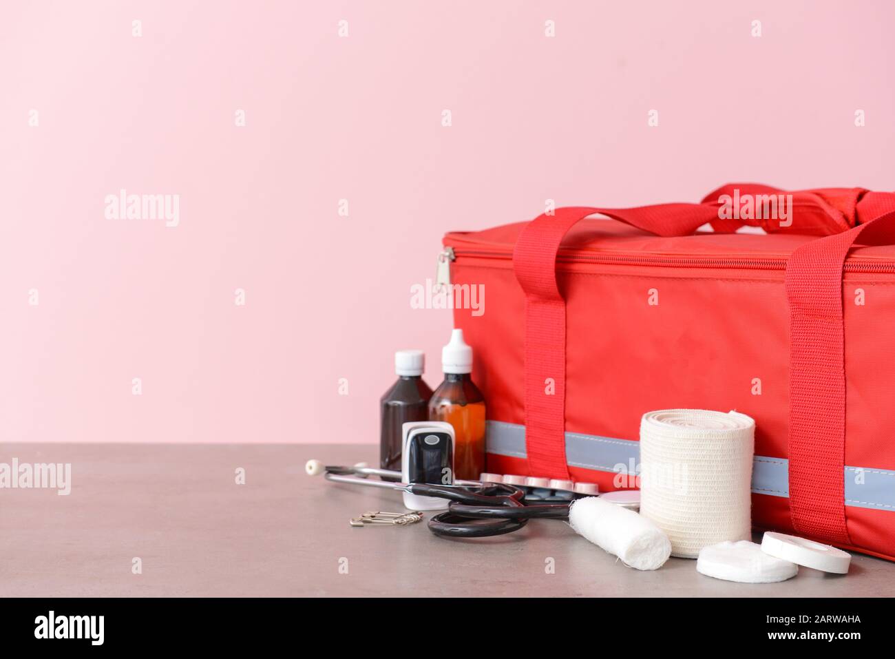 First aid kit on table Stock Photo - Alamy