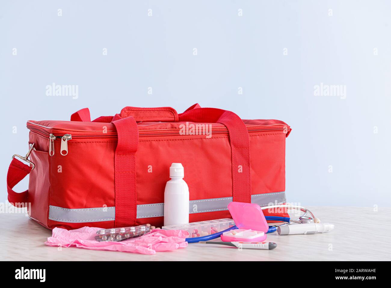 First aid kit on table Stock Photo - Alamy
