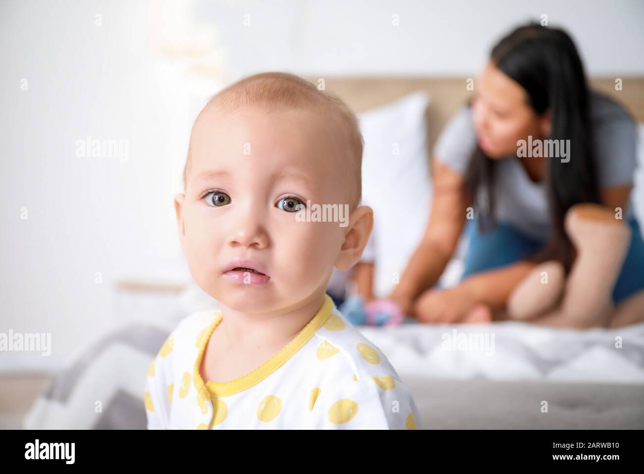 Portrait of cute little baby at home Stock Photo - Alamy