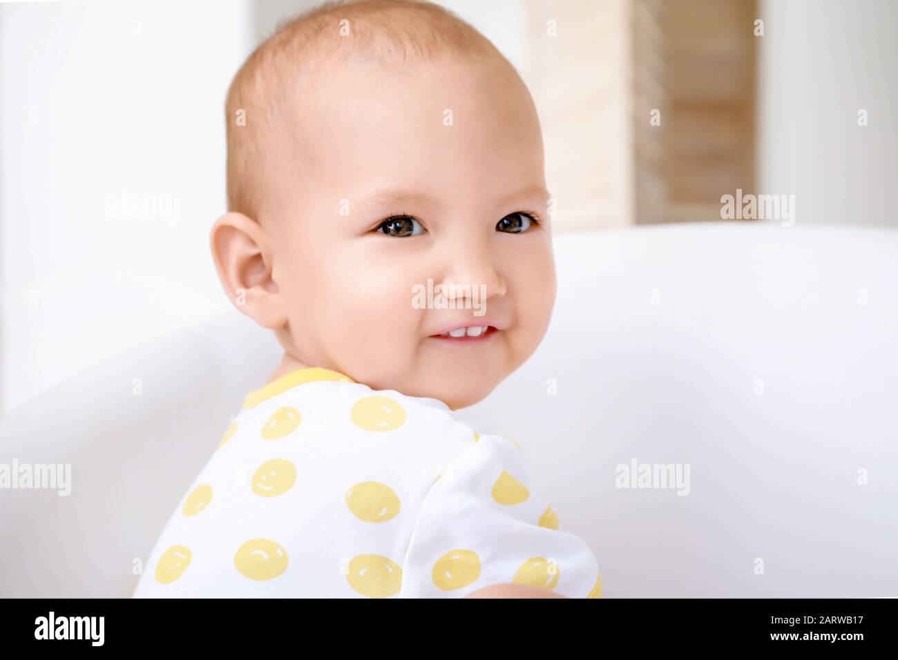 Portrait of cute little baby at home Stock Photo - Alamy