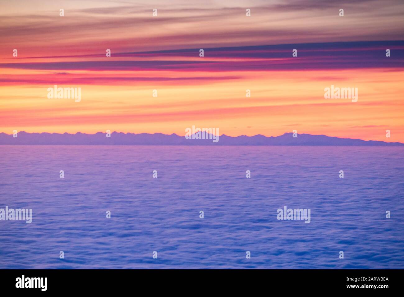 amazing sunrise over the clouds Stock Photo - Alamy