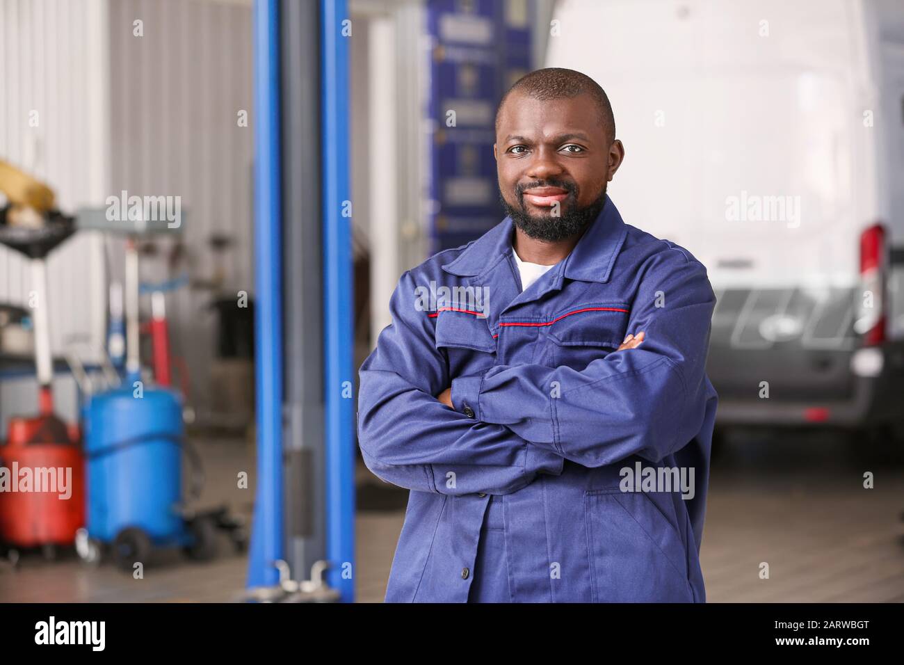 Handsome young african american mechanic hi-res stock photography and ...