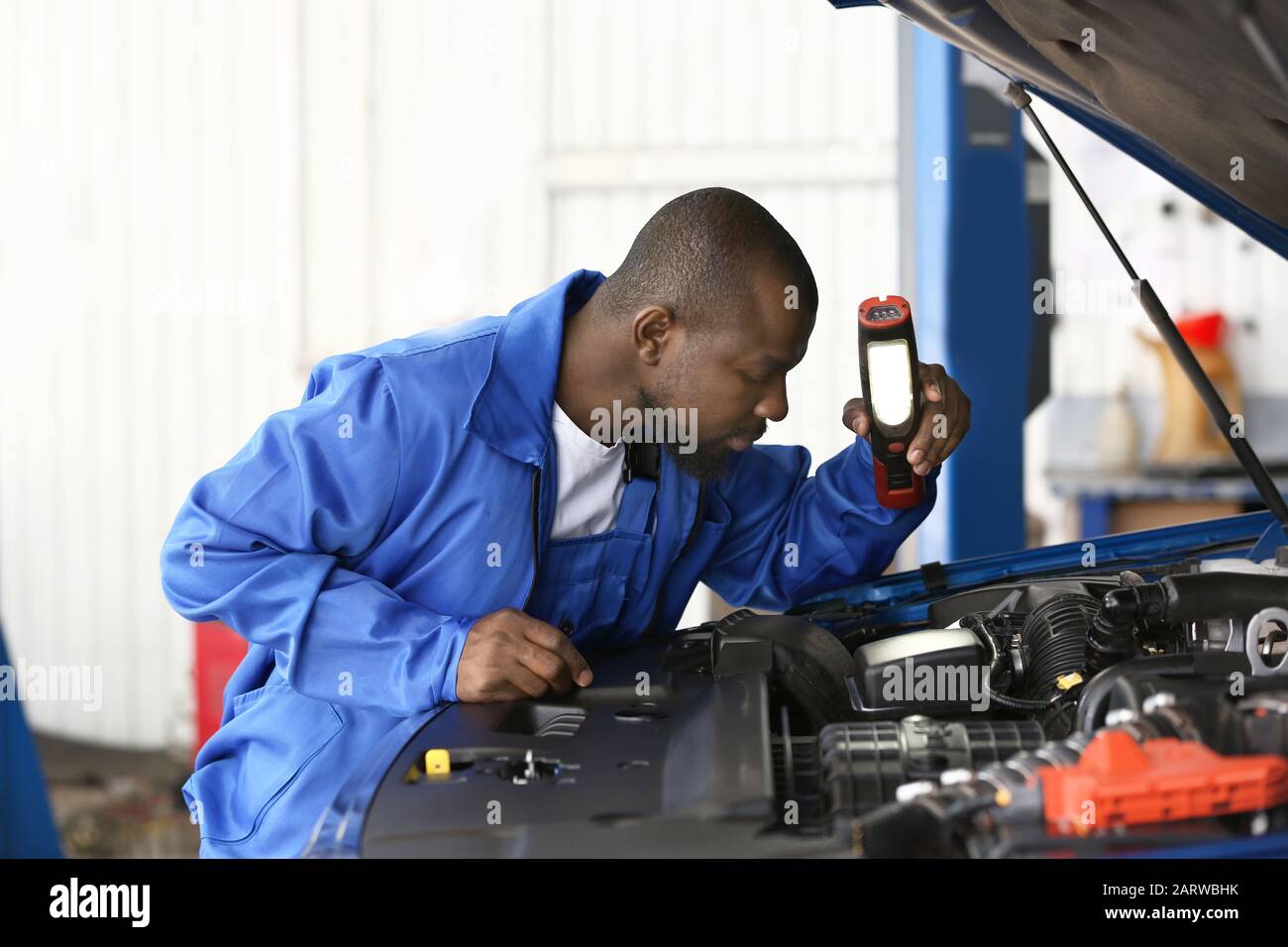 Handsome young african american mechanic hi-res stock photography and ...