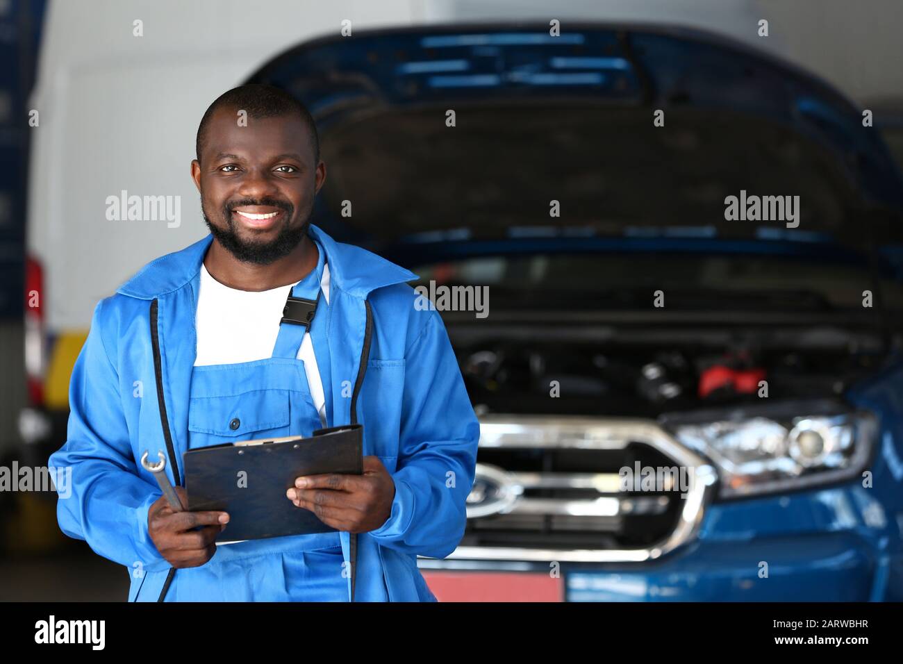 Handsome young african american mechanic hi-res stock photography and ...
