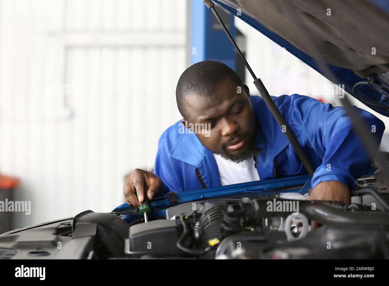 Handsome young african american mechanic hi-res stock photography and ...