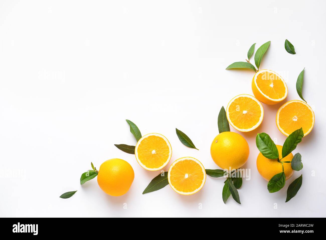 Ripe oranges on white background Stock Photo - Alamy