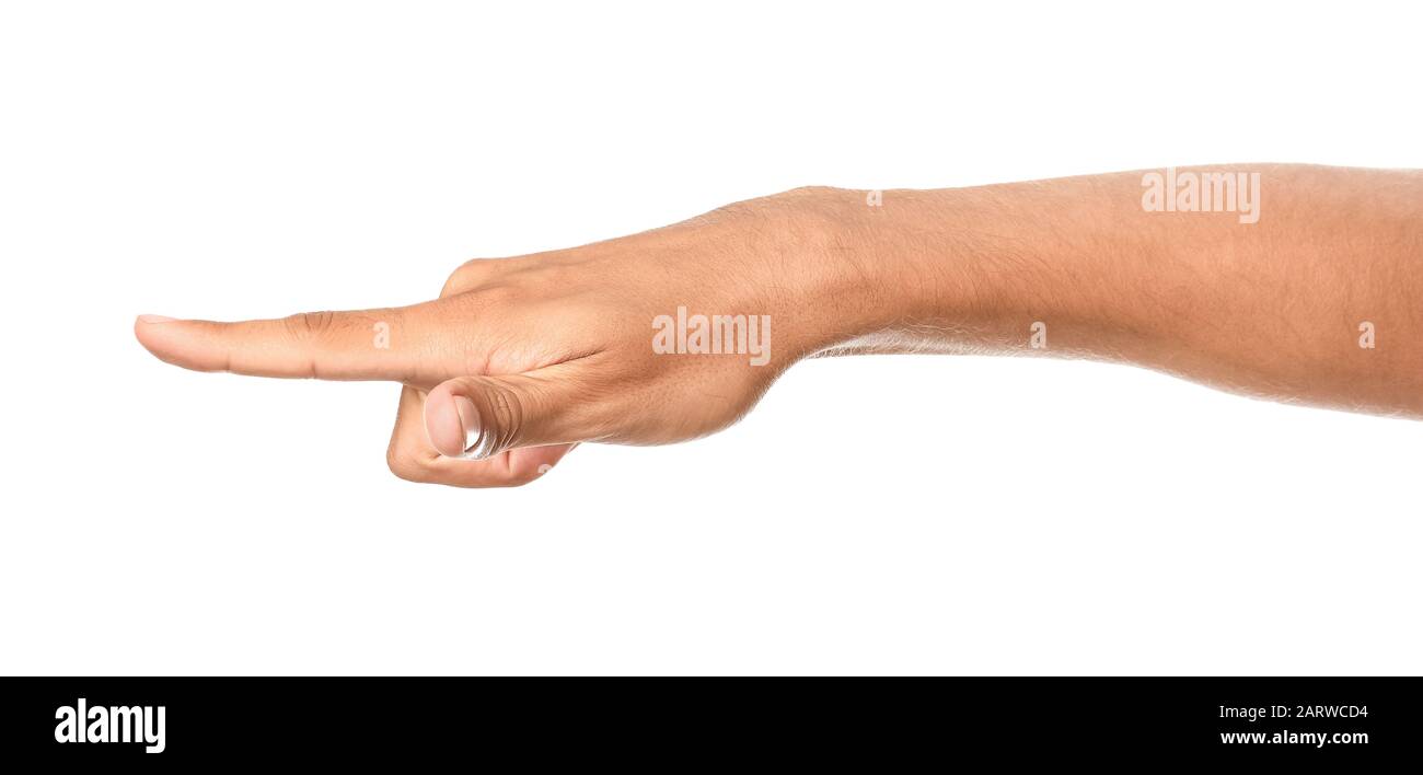 Male hand pointing at something on white background Stock Photo - Alamy