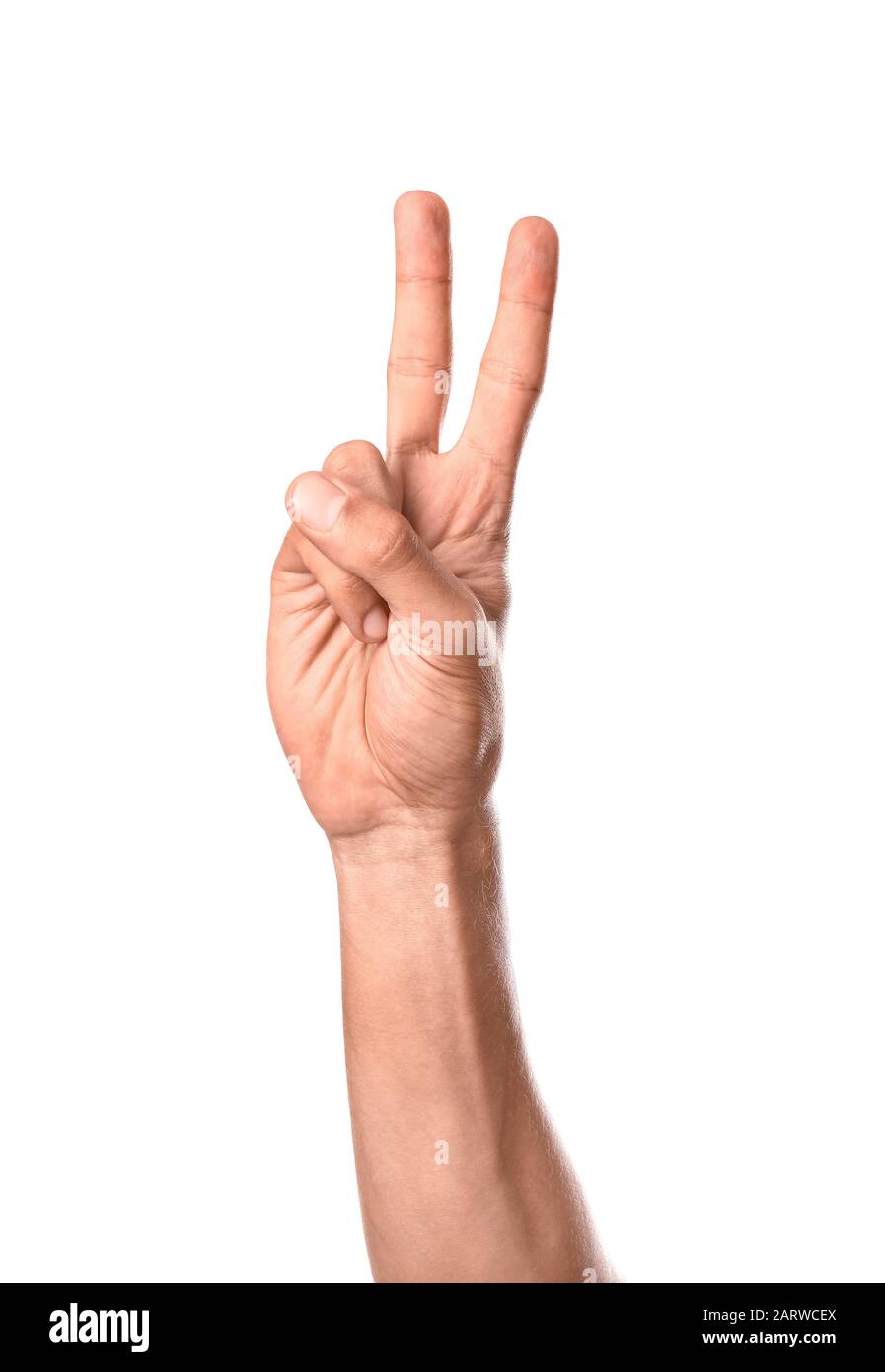 Male hand showing victory gesture on white background Stock Photo - Alamy