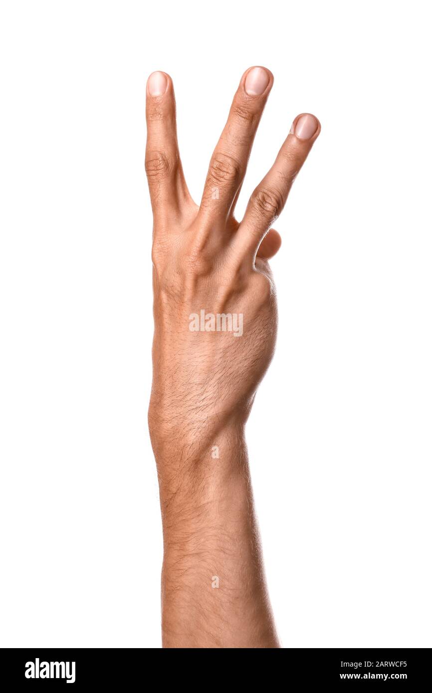 Male hand showing three fingers on white background Stock Photo - Alamy