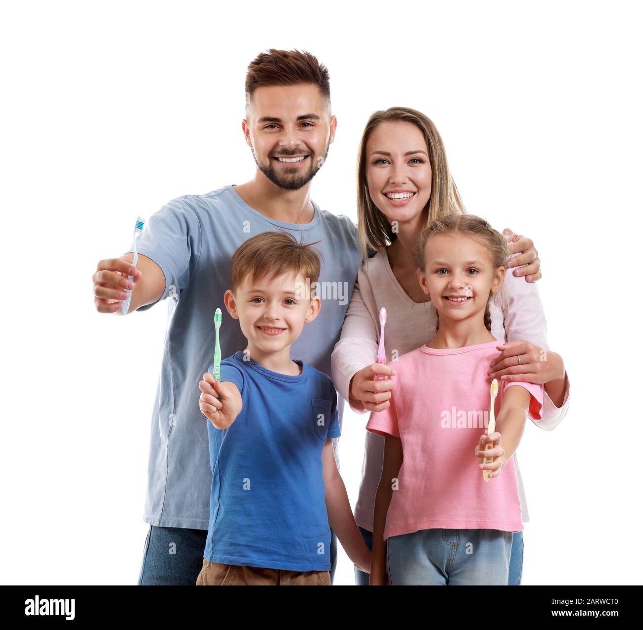 Portrait of family with toothbrushes on white background Stock Photo ...