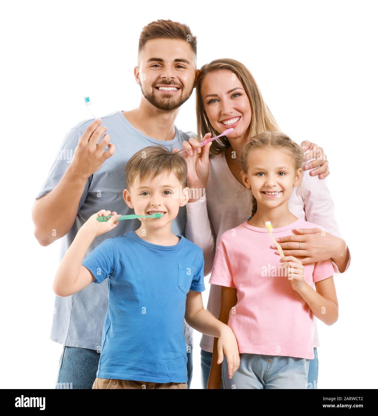 Portrait of family with toothbrushes on white background Stock Photo ...