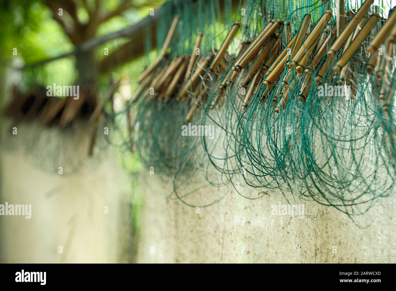 Close-up at texture of thin rustic fishing nets drying outdoor Stock ...