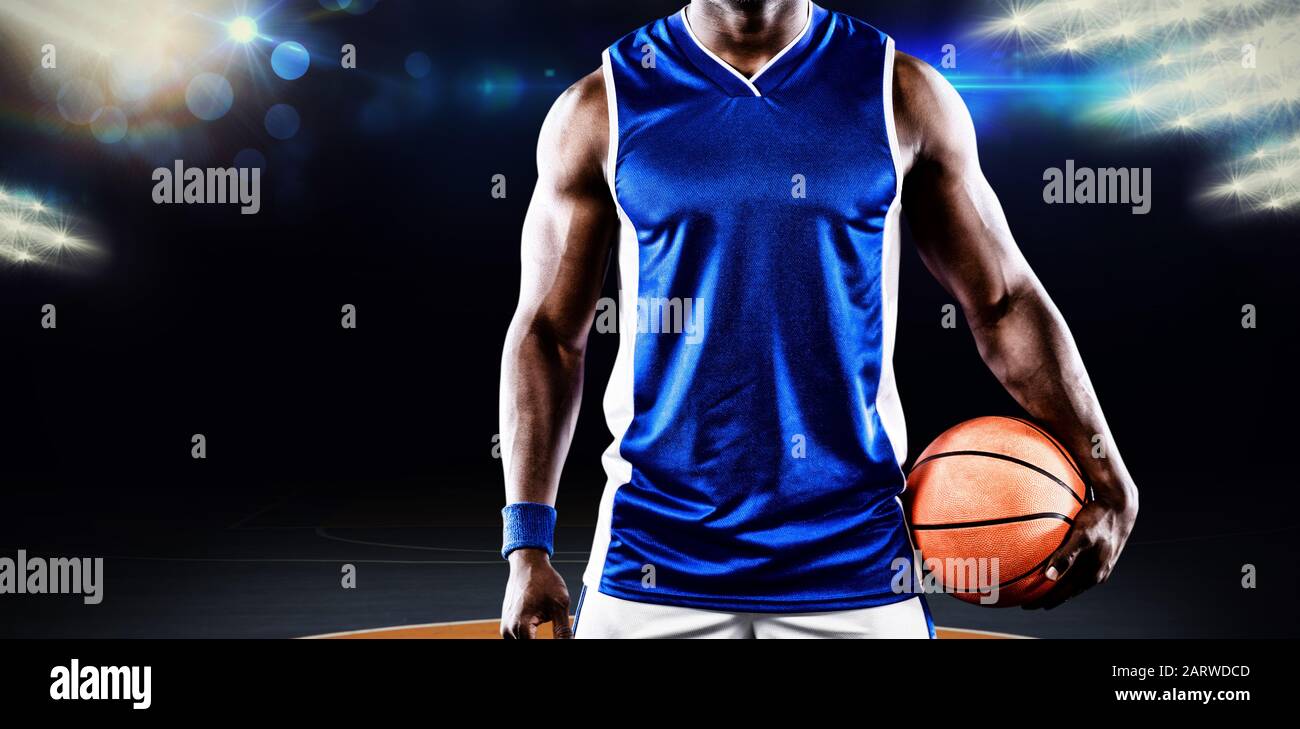 Composite image of basketball player Stock Photo - Alamy