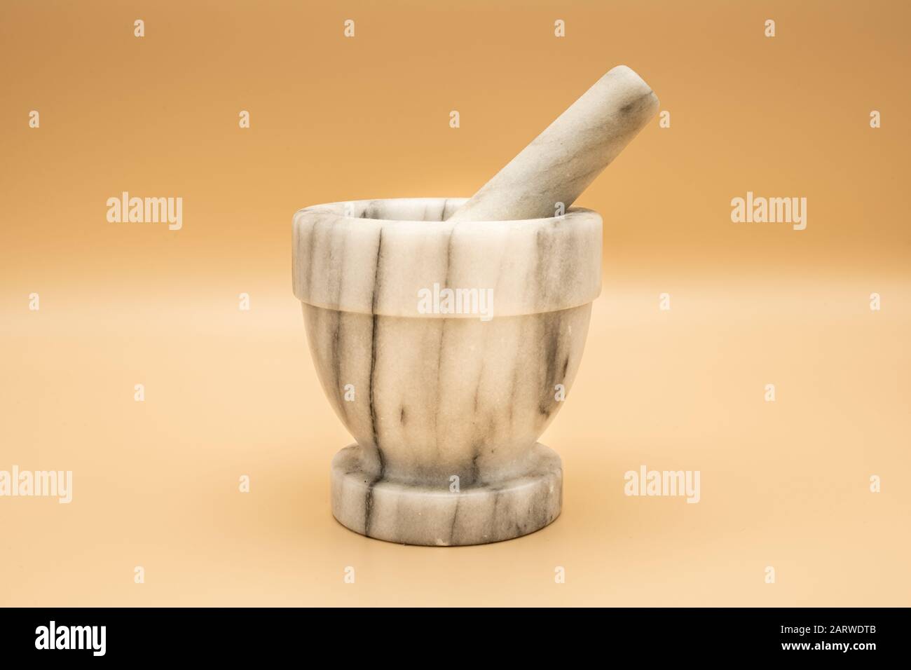 Closeup of a small kitchen mortar and pestle made of stone Stock Photo ...