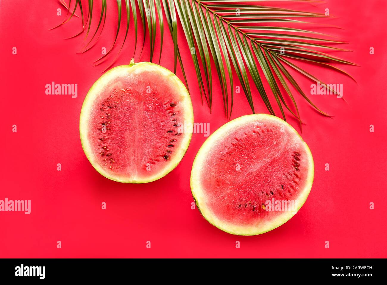 Sweet cut watermelon on color background Stock Photo - Alamy