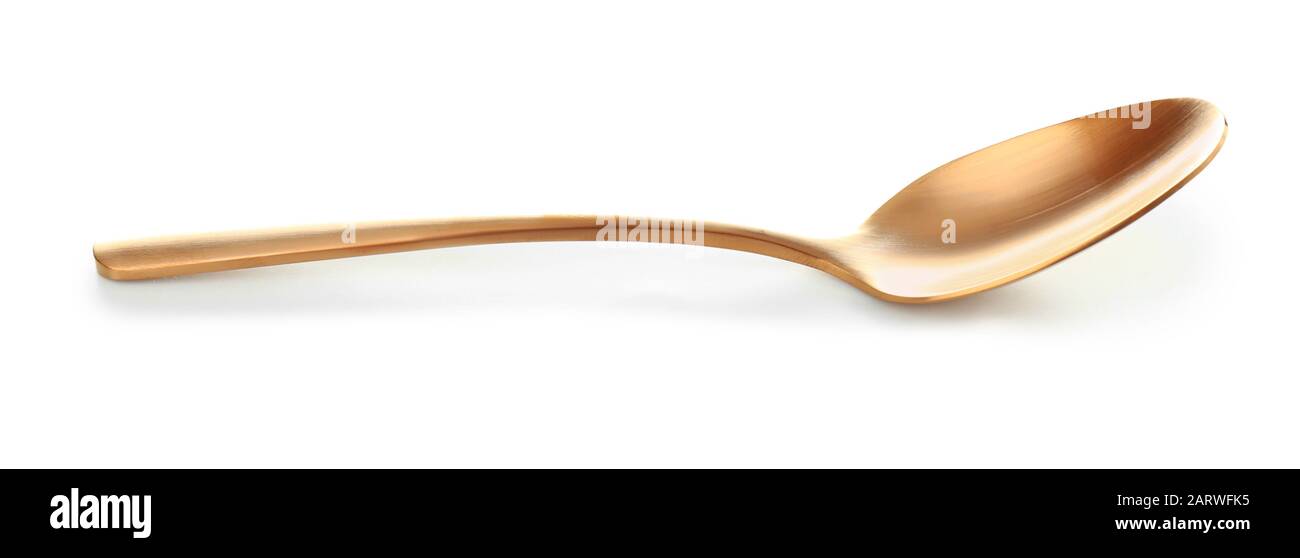 Golden spoon on white background Stock Photo - Alamy