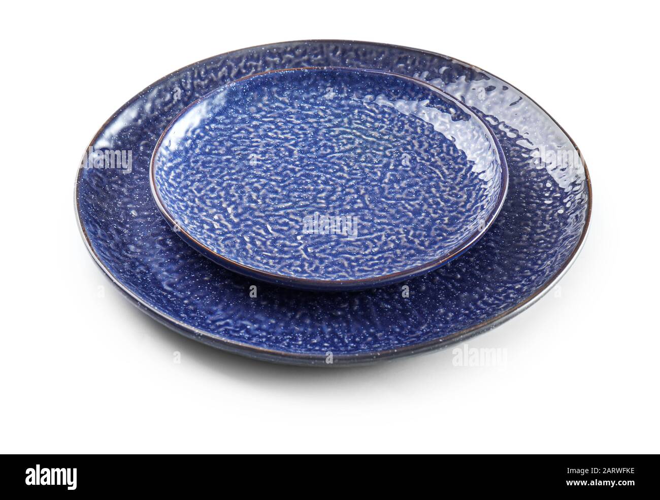 Empty plates table Cut Out Stock Images & Pictures - Alamy