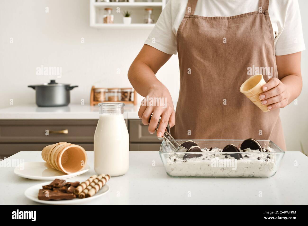 Woman preparing ice cream hi-res stock photography and images - Alamy