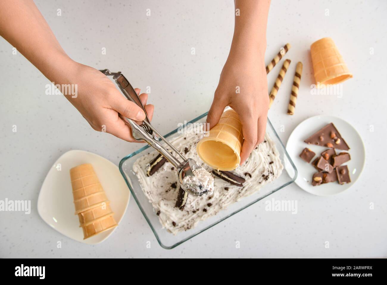 Woman preparing ice cream hi-res stock photography and images - Alamy