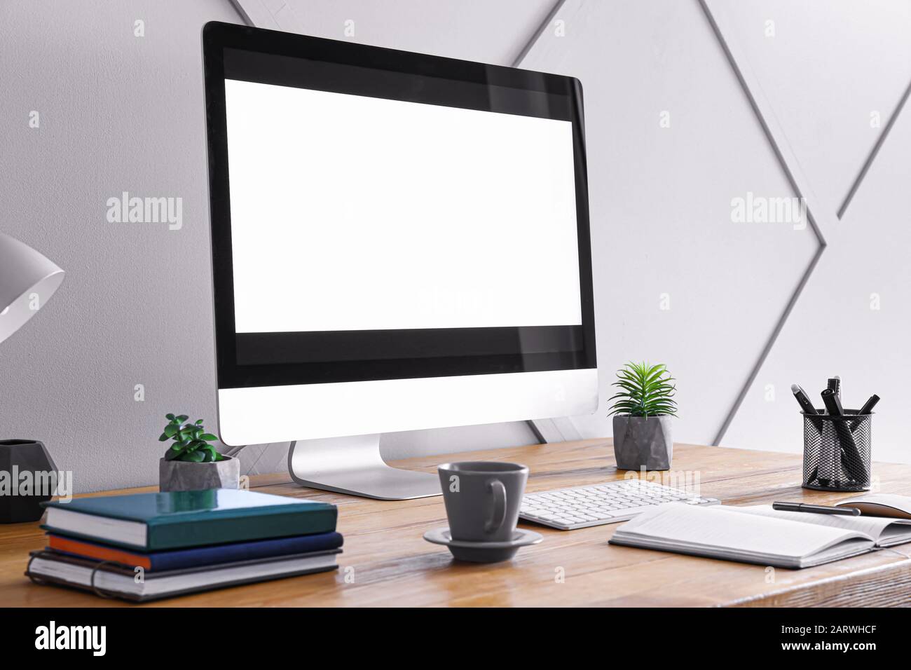 Comfortable workplace with modern computer in office Stock Photo - Alamy