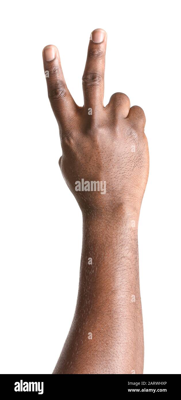 Hand of African-American man showing victory gesture on white ...