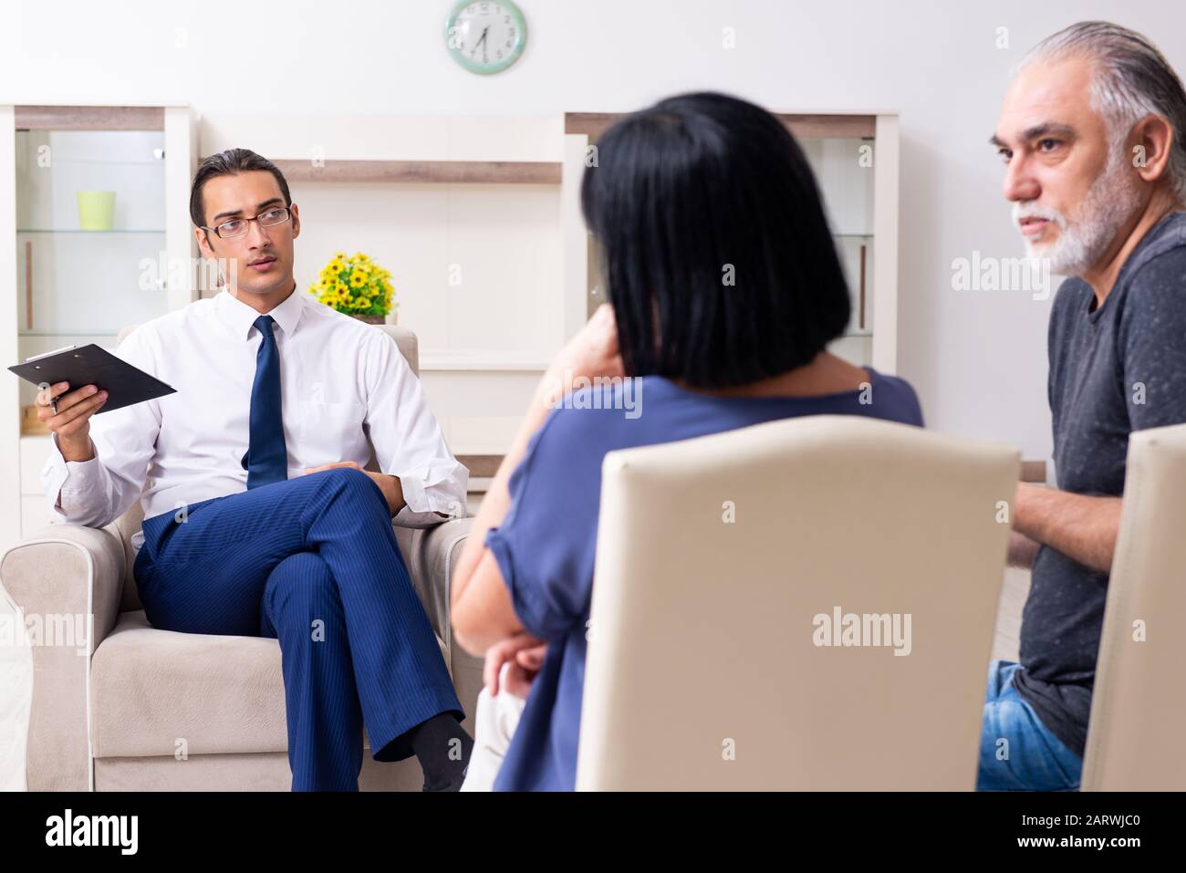 The old couple visiting psychiatrist doctor Stock Photo - Alamy