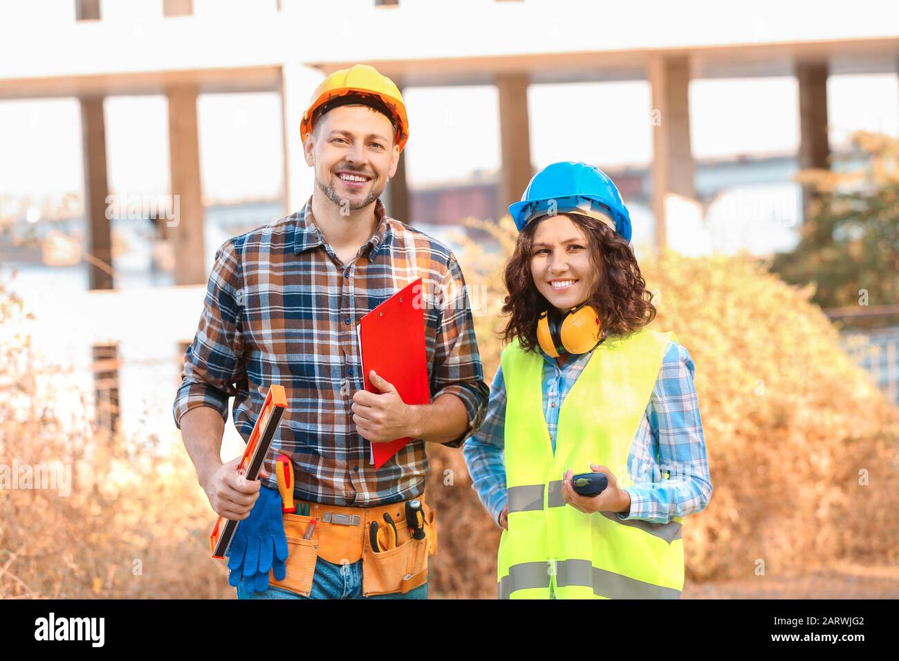 Portrait of architects in building area Stock Photo - Alamy