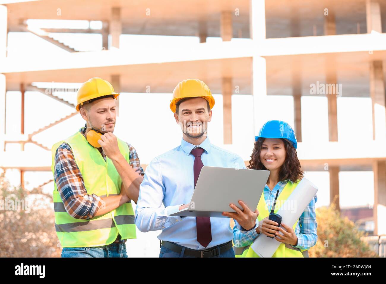 Team of architects in building area Stock Photo - Alamy