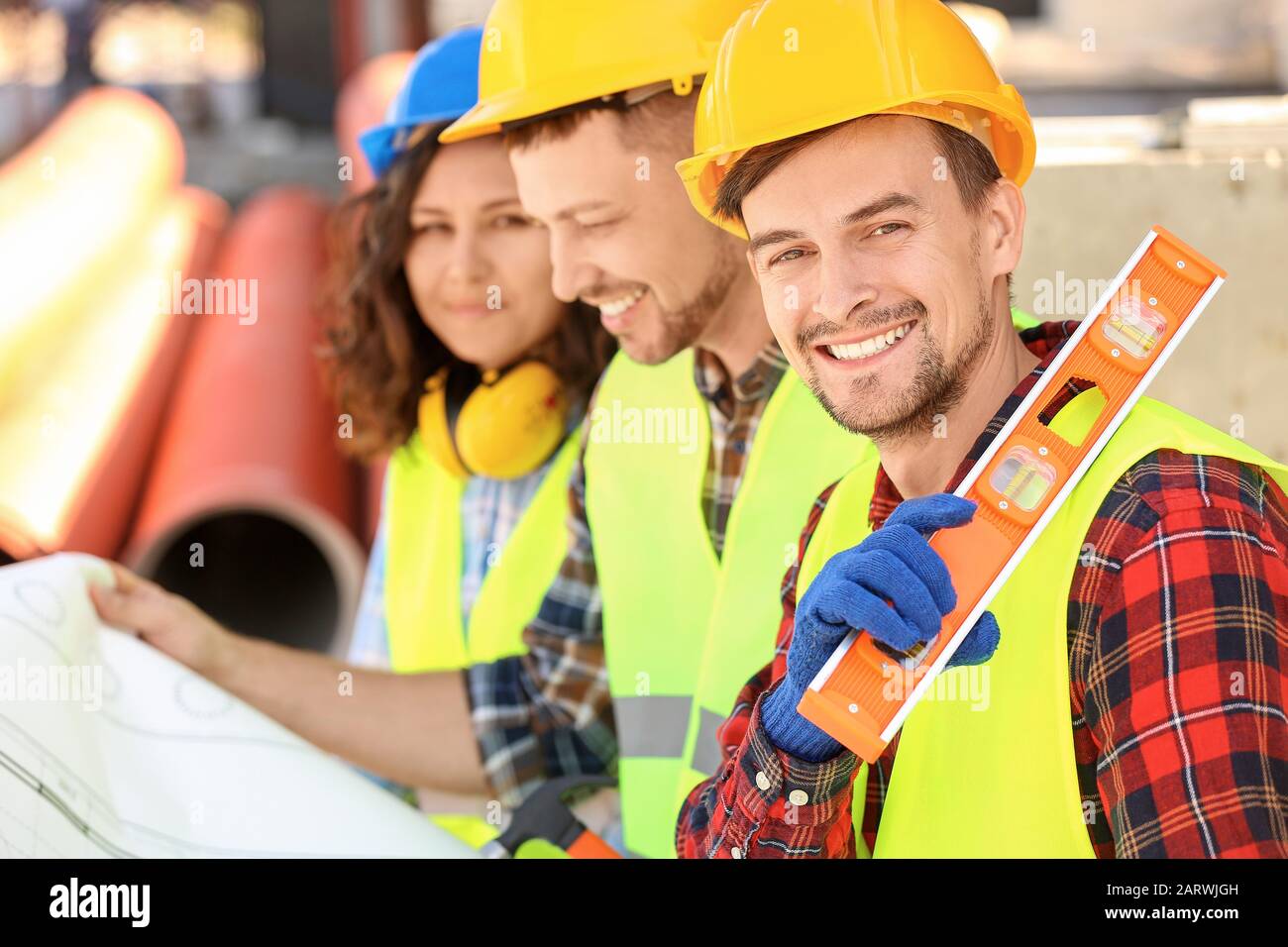 Portrait of architects in building area Stock Photo - Alamy