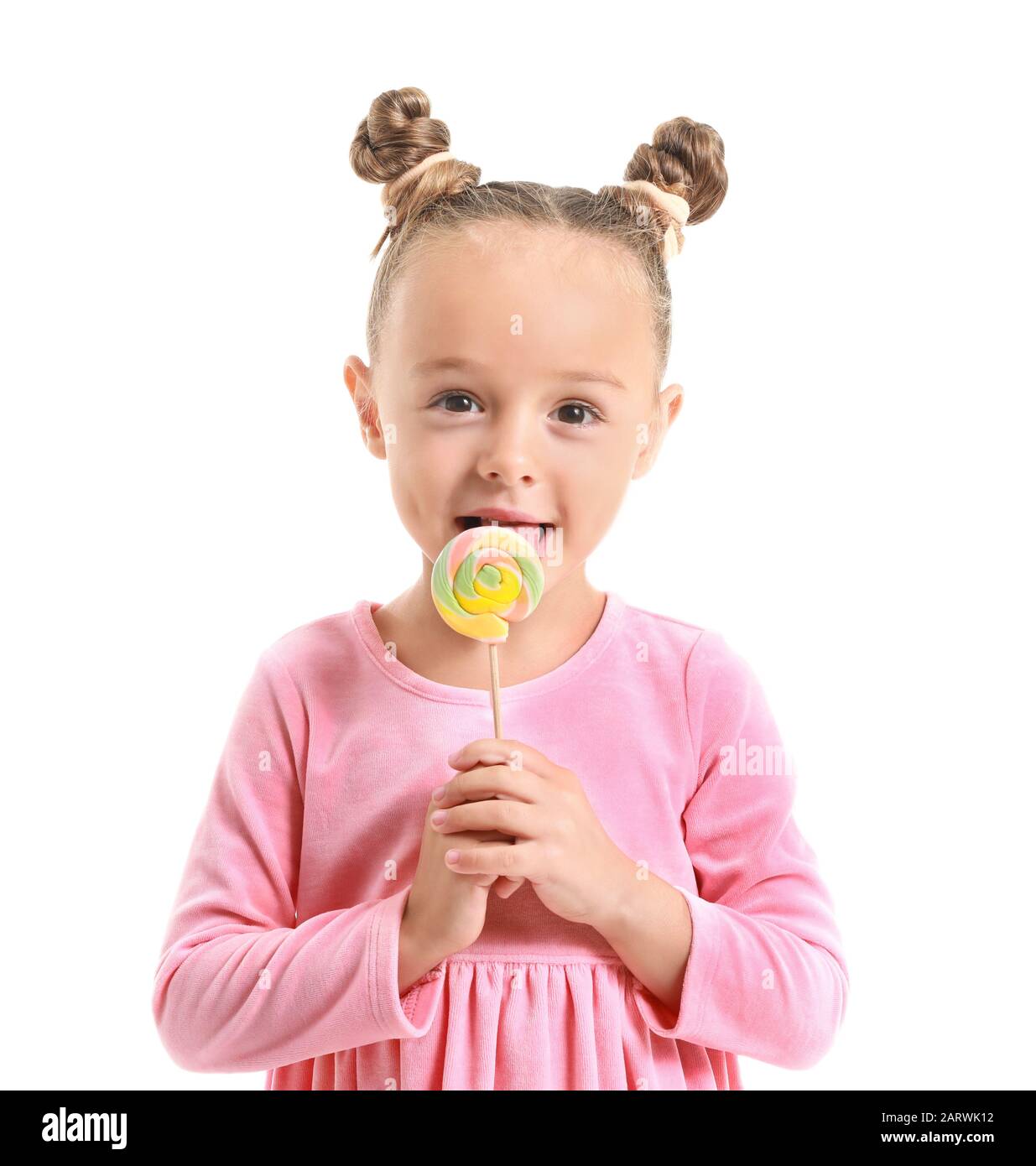Cute little girl with sweet lollipop on white background Stock Photo ...