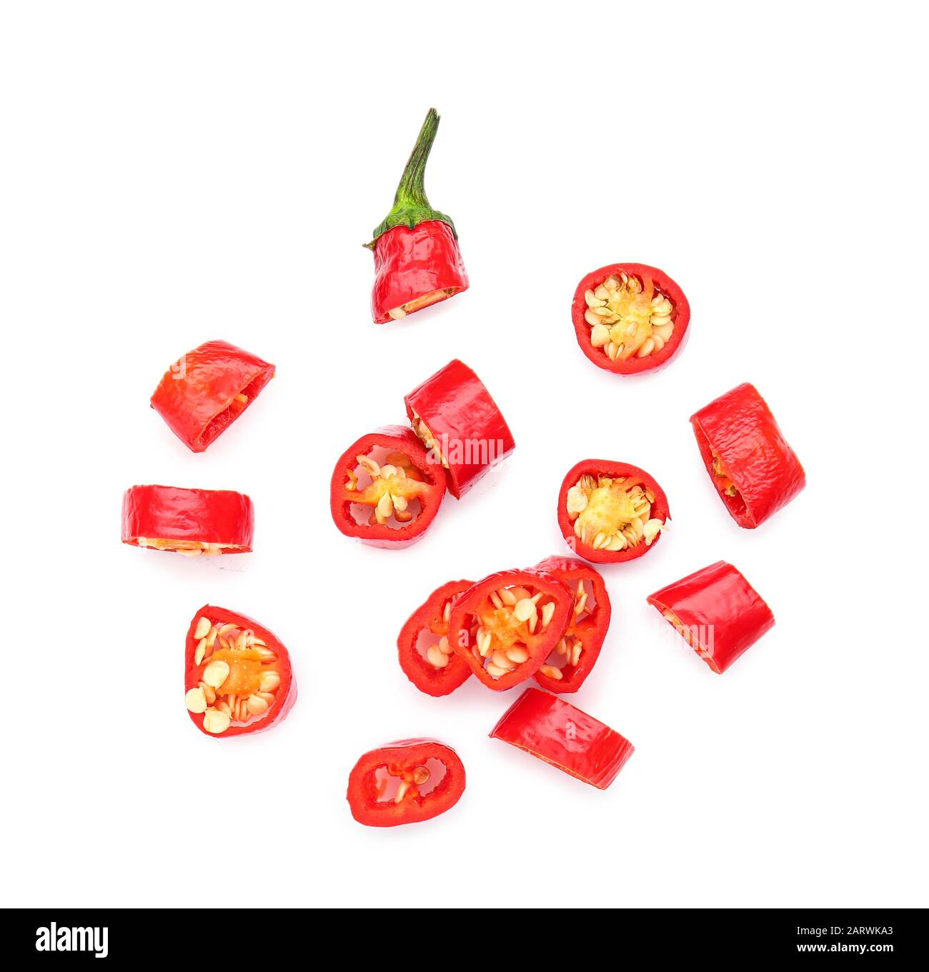 Cut chili pepper on white background Stock Photo - Alamy