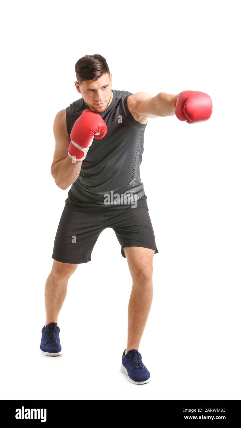Sporty young boxer on white background Stock Photo - Alamy