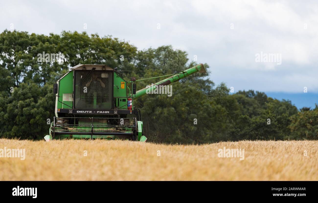 Farmer ireland combine harvester hi-res stock photography and images ...