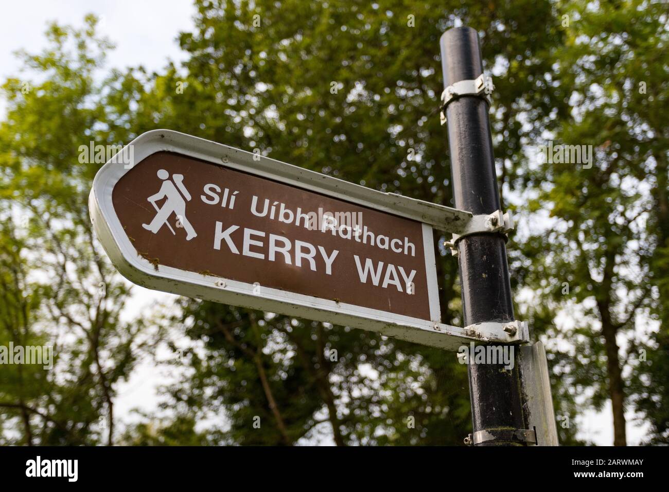 Sign for Kerry way trail written in Gaelic and English language, County ...