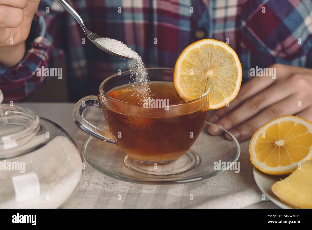 Woman pouring sweetener hi-res stock photography and images - Alamy