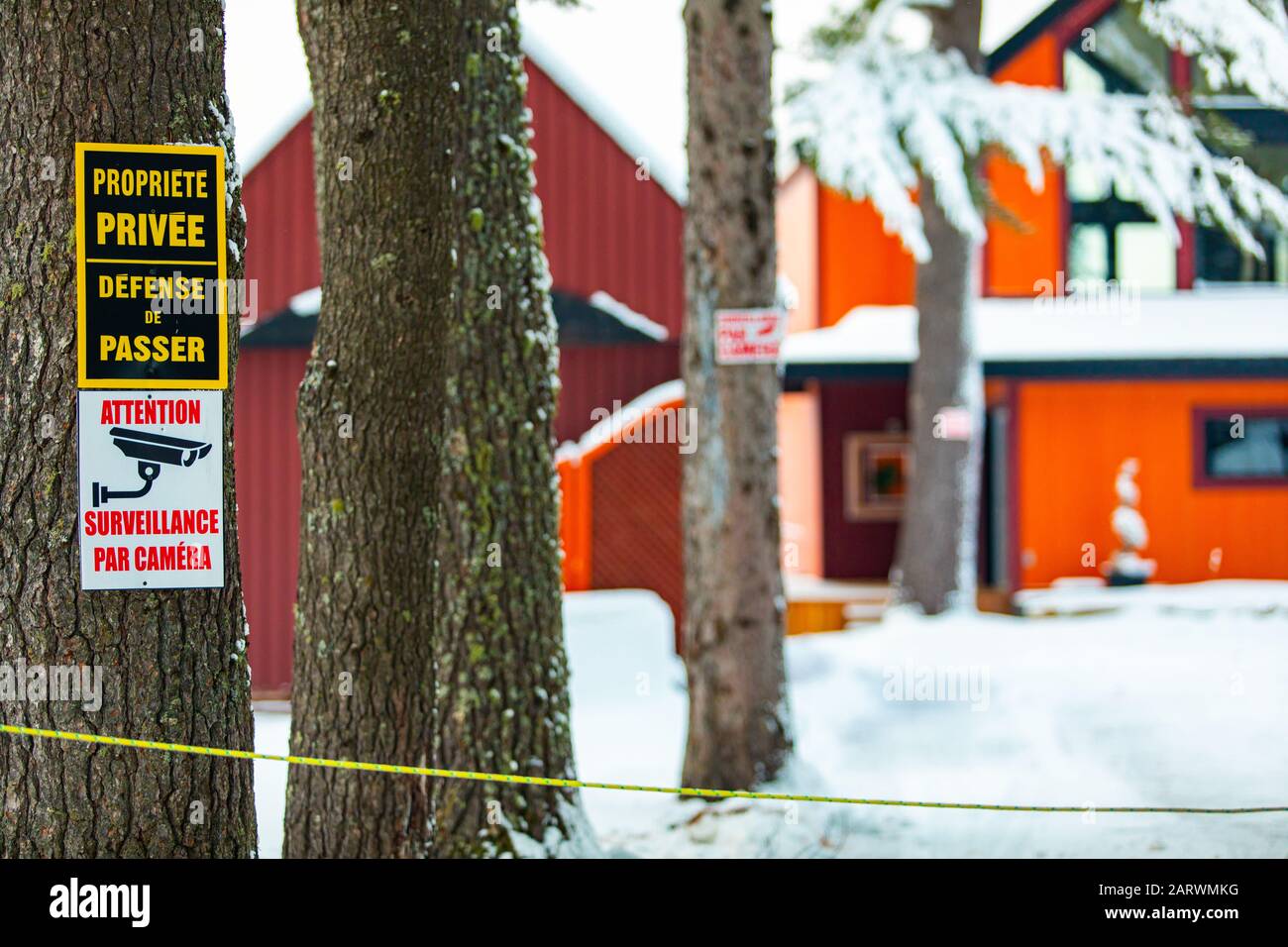 Private estate, no entry warning and security camera signs are seen ...
