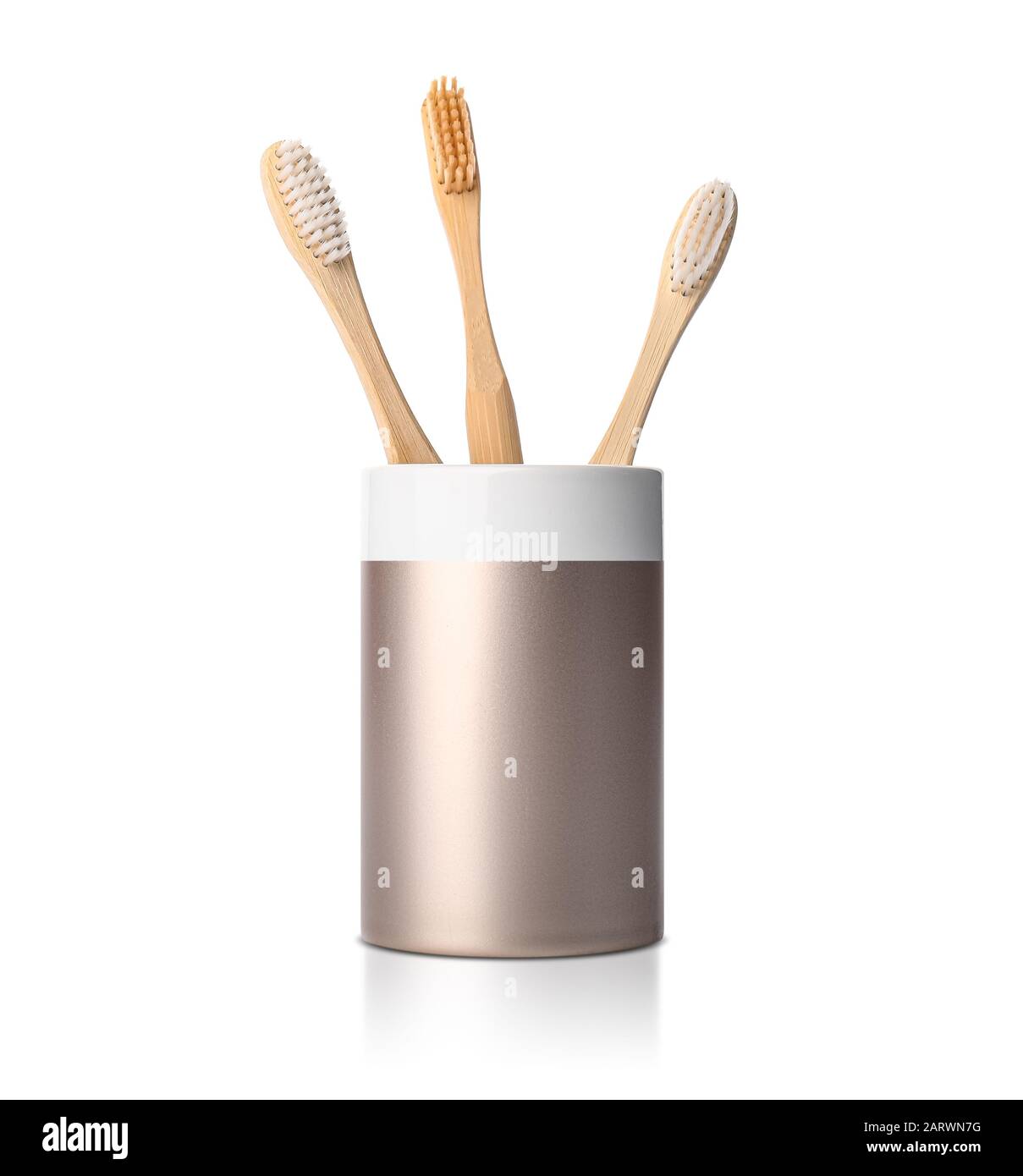 Cup with wooden tooth brushes on white background Stock Photo - Alamy