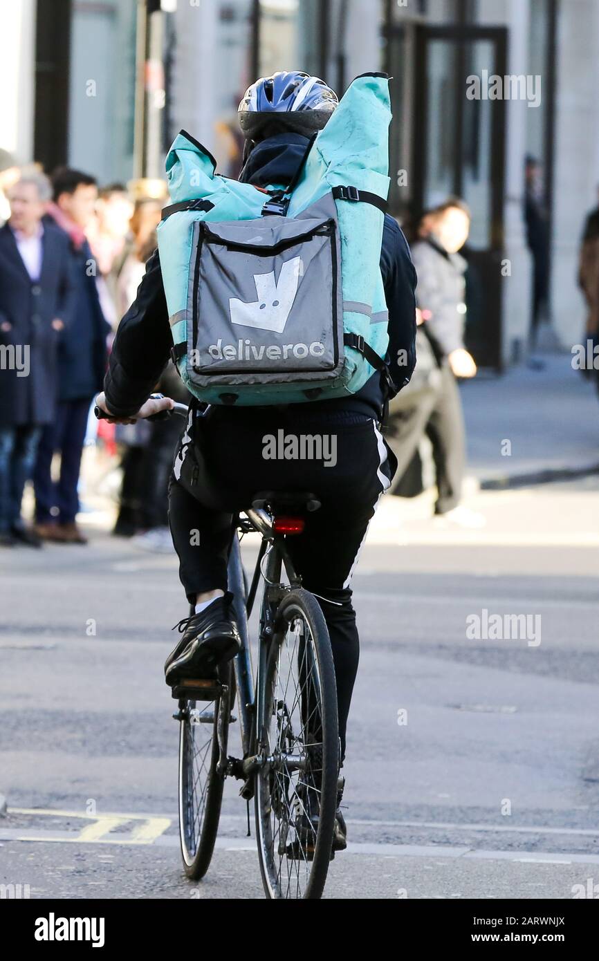 January 29, 2020, London, United Kingdom: A Deliveroo cyclist riding ...