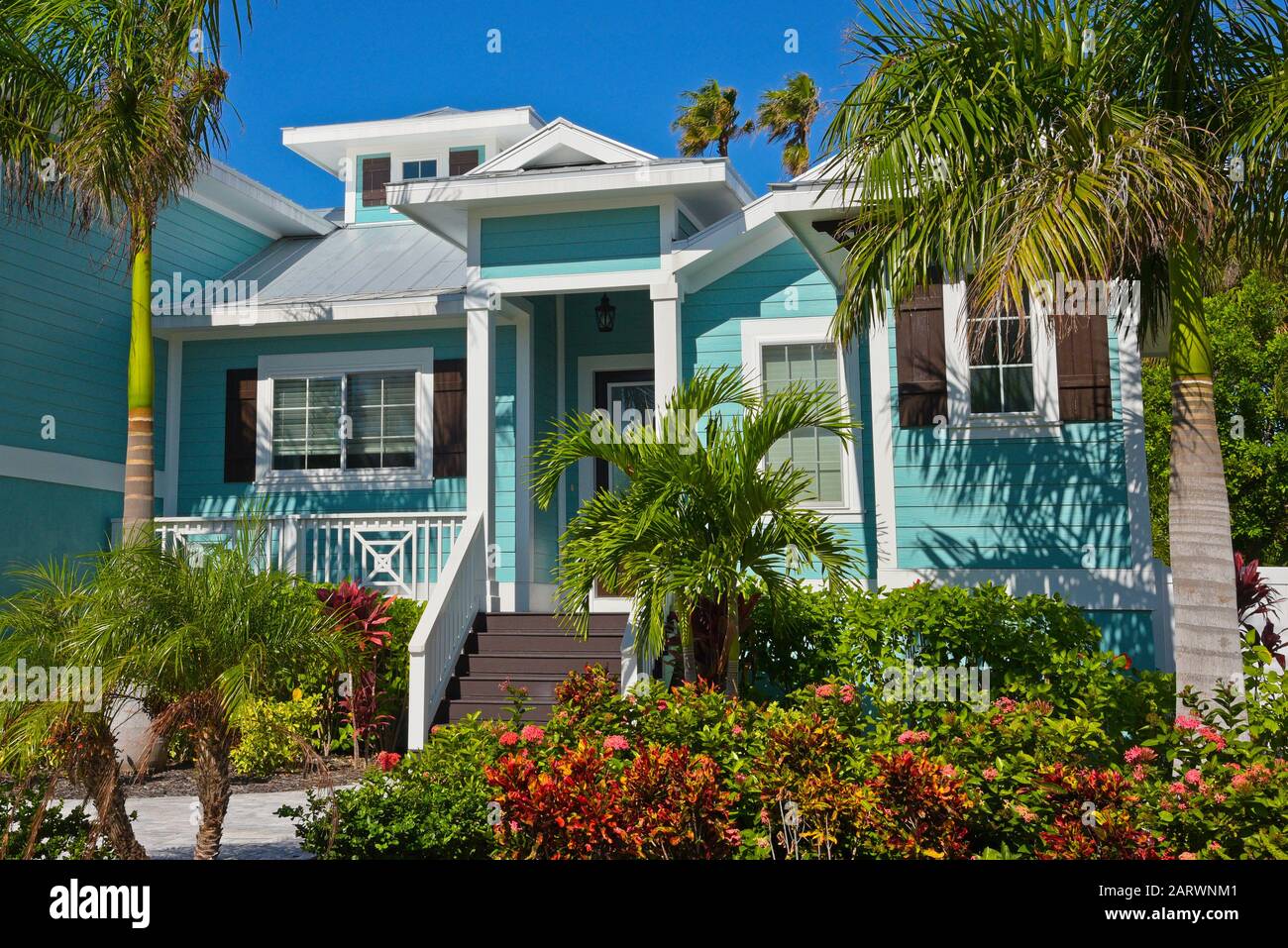 Beautiful New Florida House with Palms Trees and Landscaping Stock ...