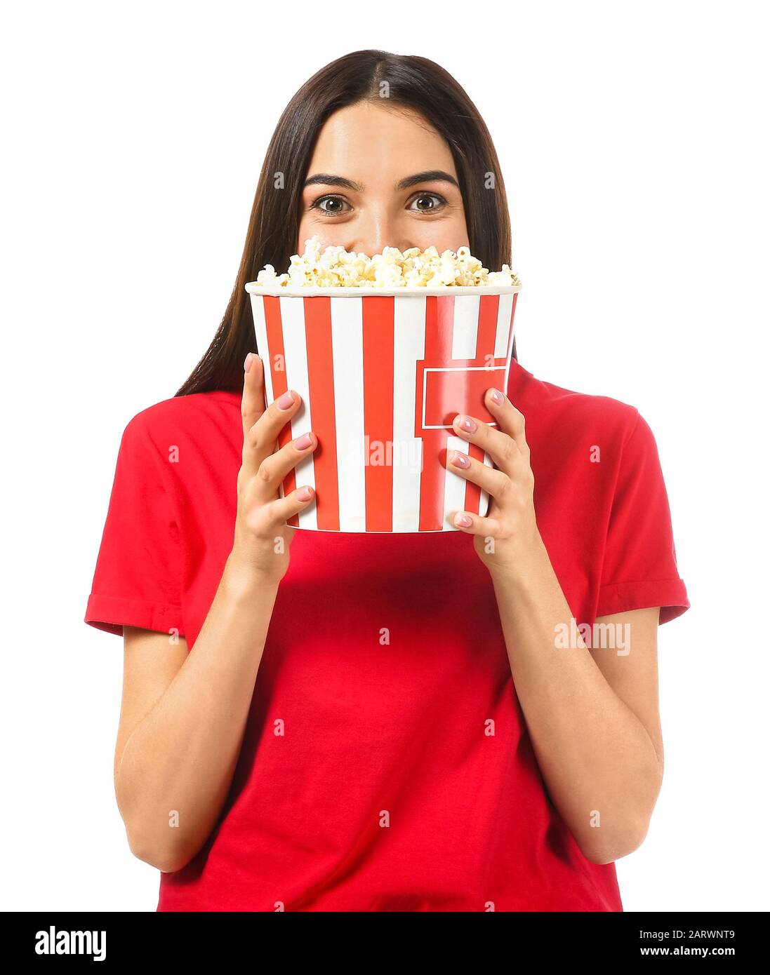 Young woman with popcorn on white background Stock Photo - Alamy