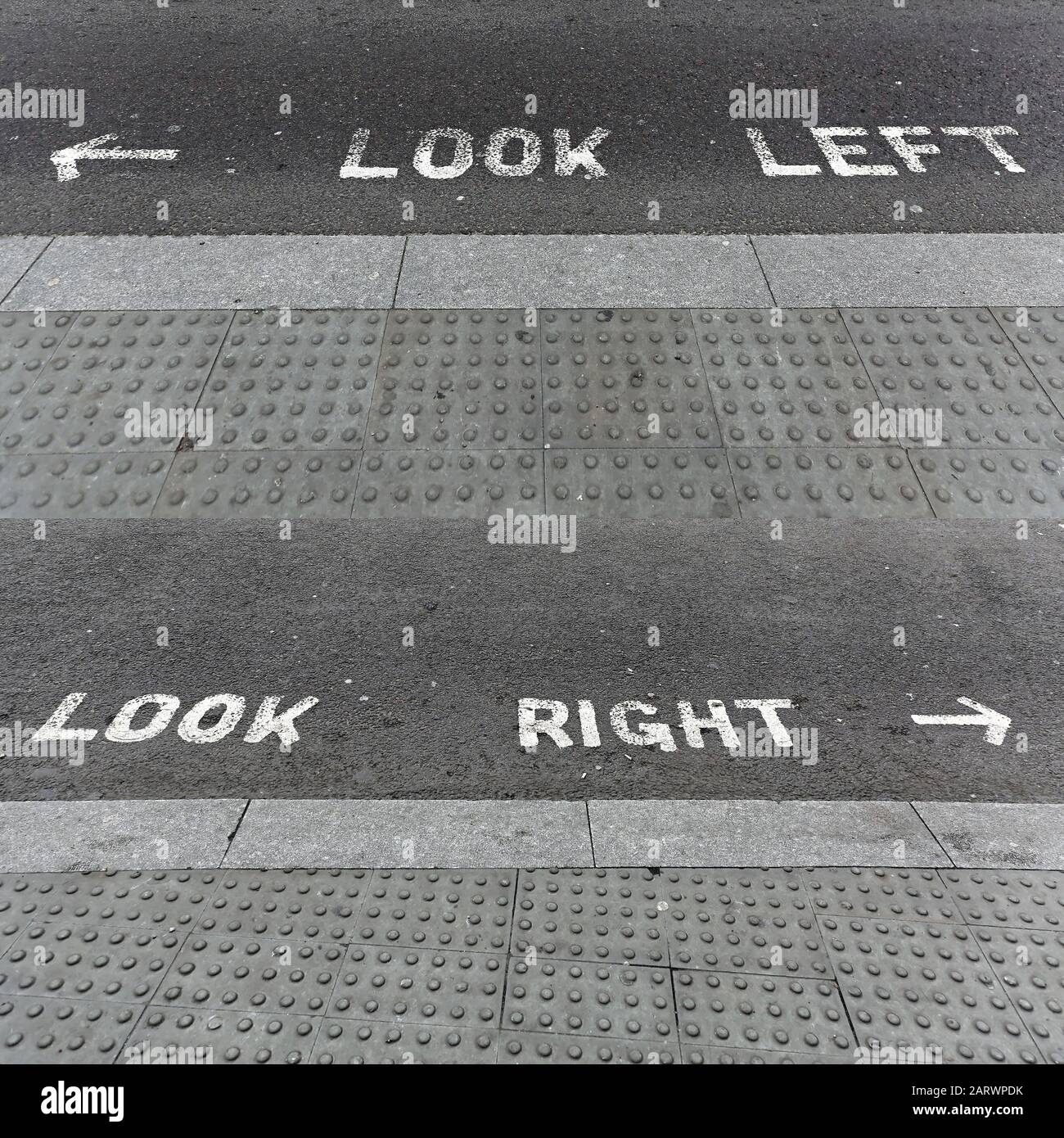 Look left and look right at pedestrian crossing Stock Photo - Alamy