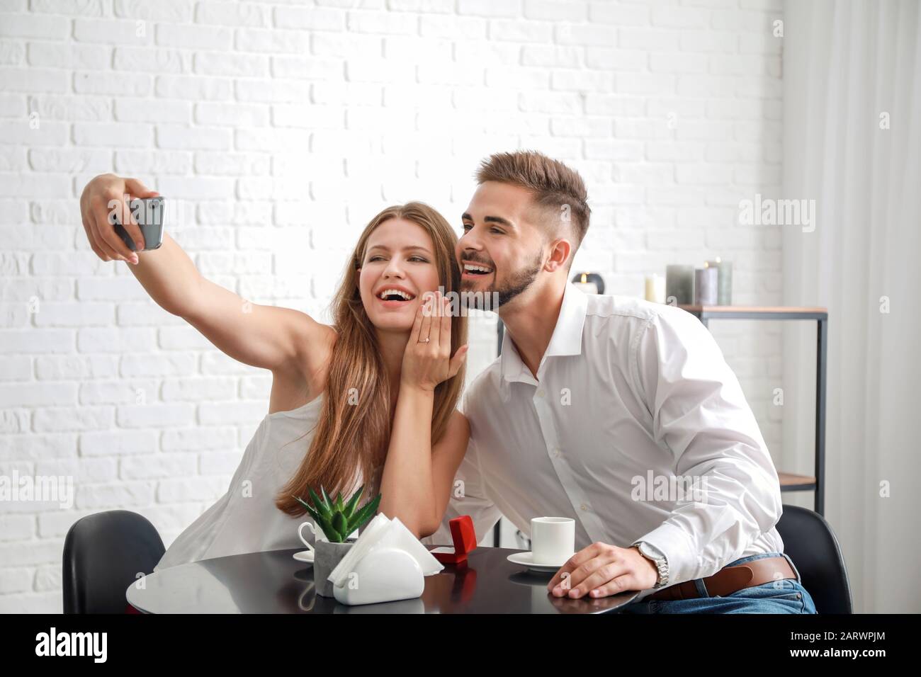 Happy boyfriend girlfriend engaged in hi-res stock photography and ...